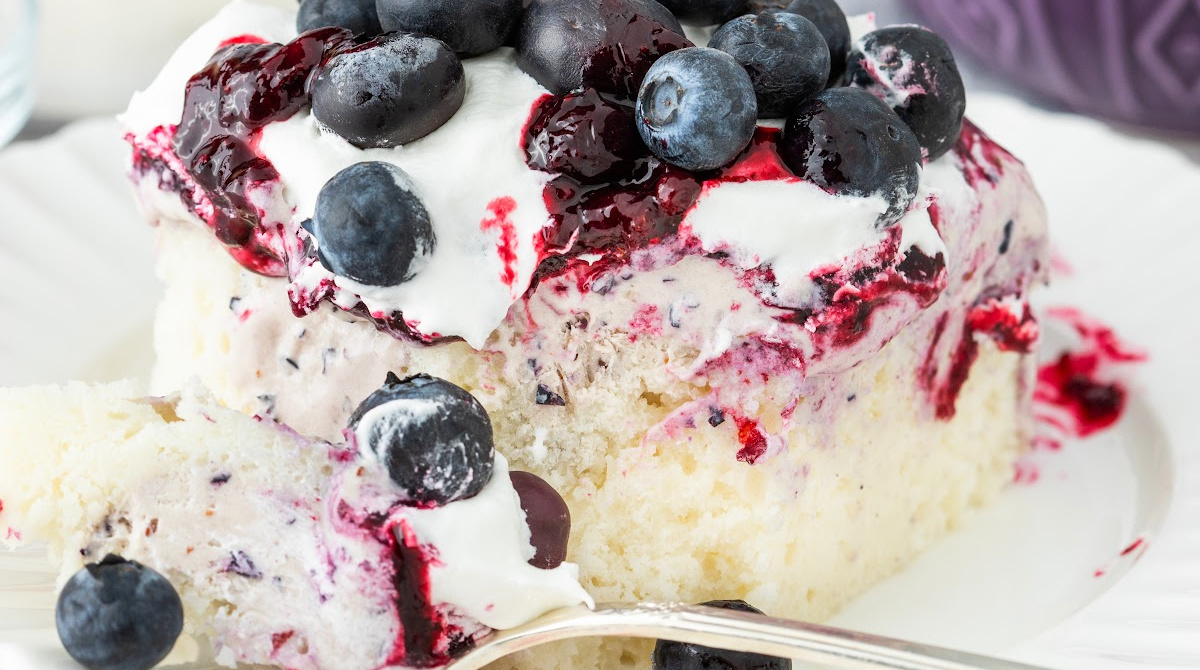 Blueberry Cheesecake Poke Cake with Real Blueberry Layers | Noble Pig